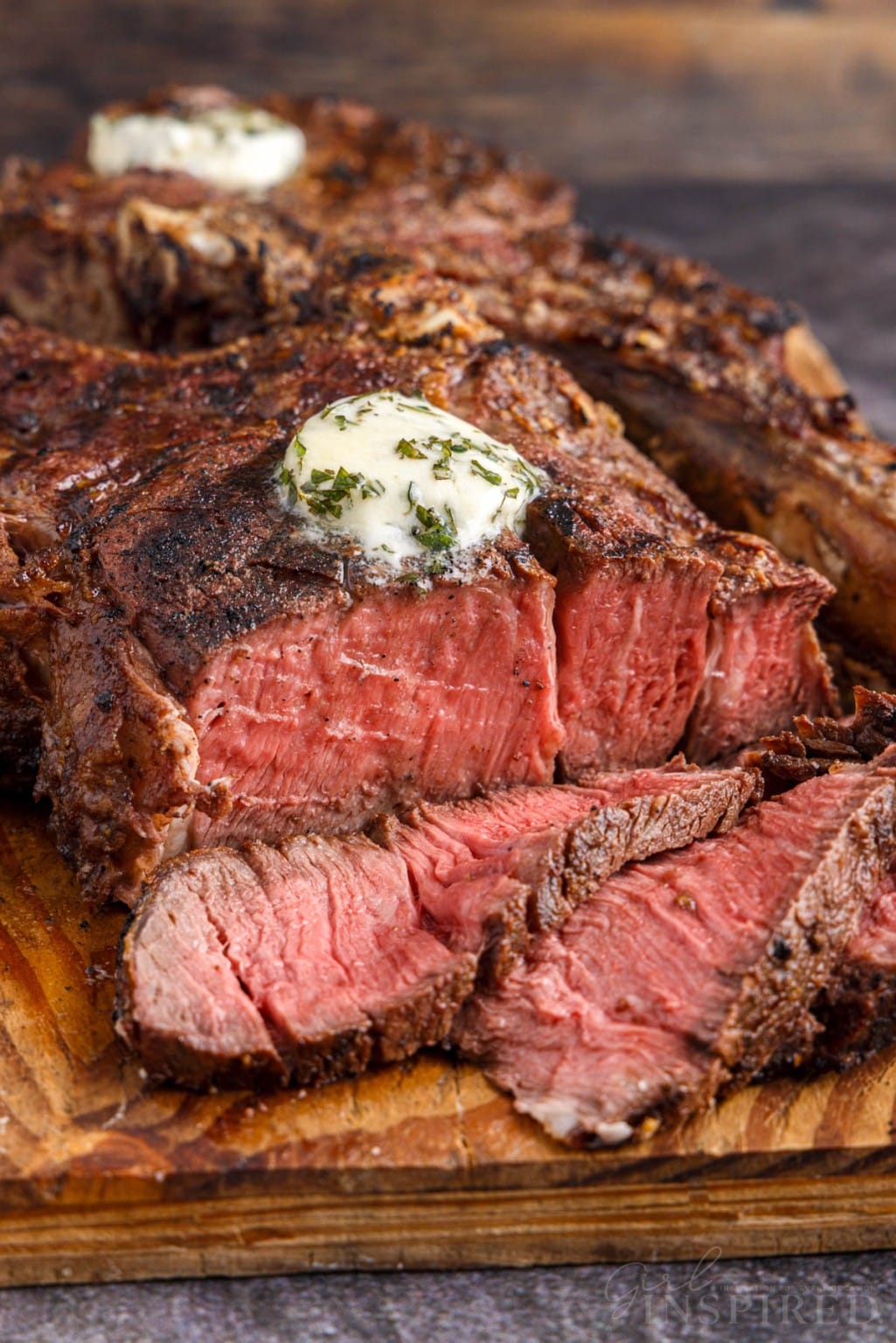 Tomahawk Steak BBQ - girl. Inspired.